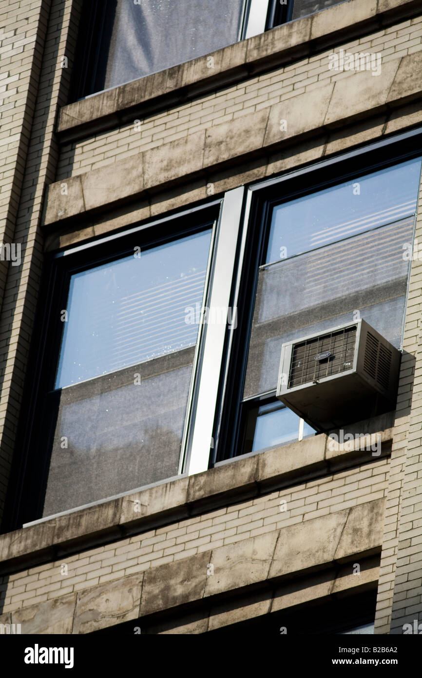 window with air conditioner in New York City Stock Photo - Alamy