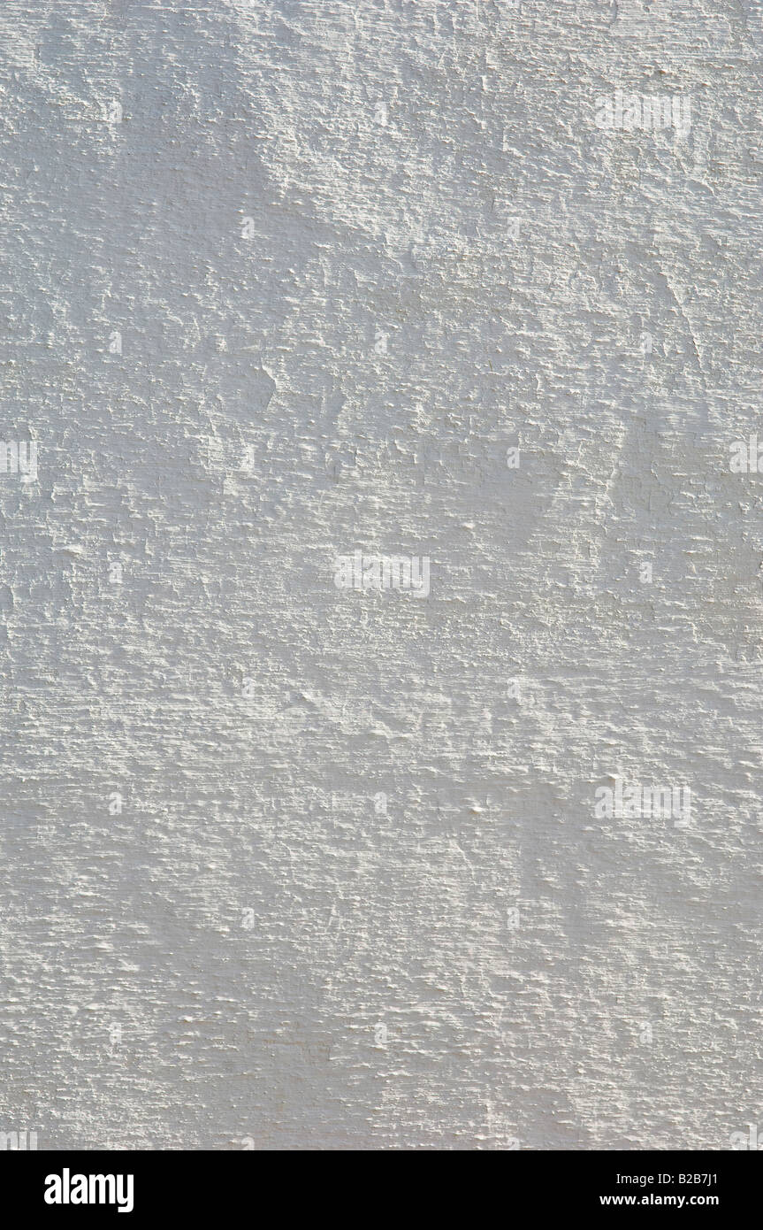 Detail of a rugged white wall Stock Photo - Alamy