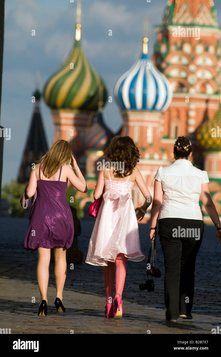 Young women going to graduation ceremony in Red Square, Moscow, Russia ...