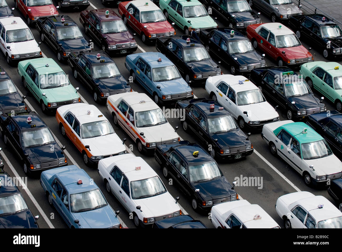 Pattern of taxi cabs waiting for a fare in front of Kyoto train station makes for an interesting ...
