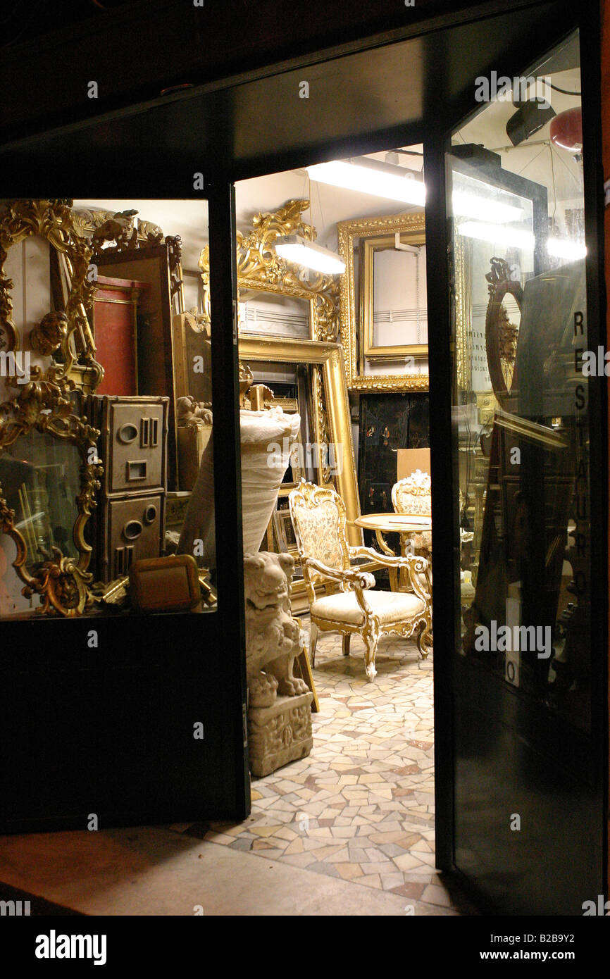 The view into a framing workshop in Rome Italy Stock Photo - Alamy