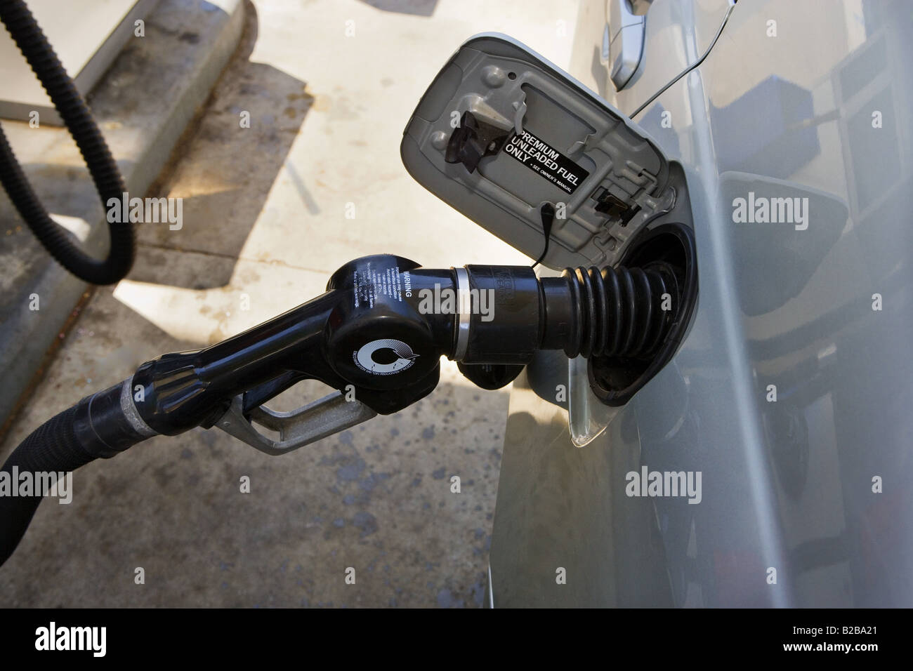 Car being filled up with gas Stock Photo - Alamy