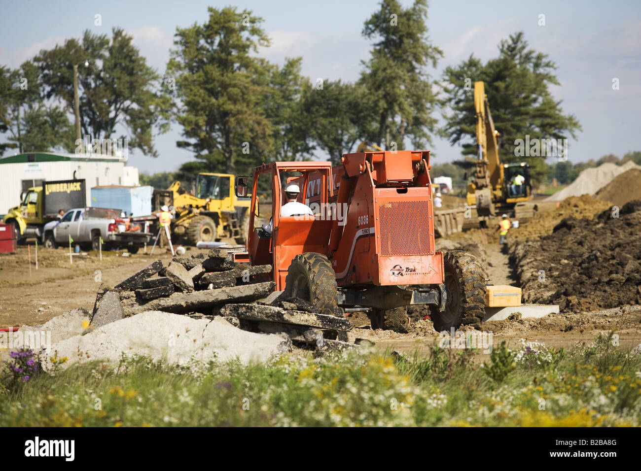 Excavators at work site Stock Photo - Alamy