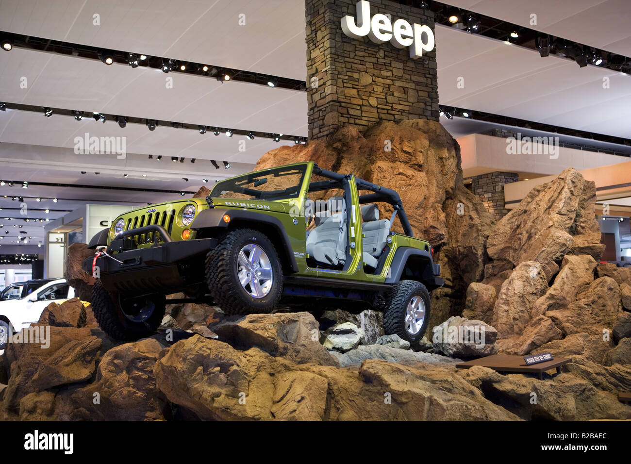 Jeep Wrangler on rock facade at 2008 Detroit auto show Stock Photo - Alamy