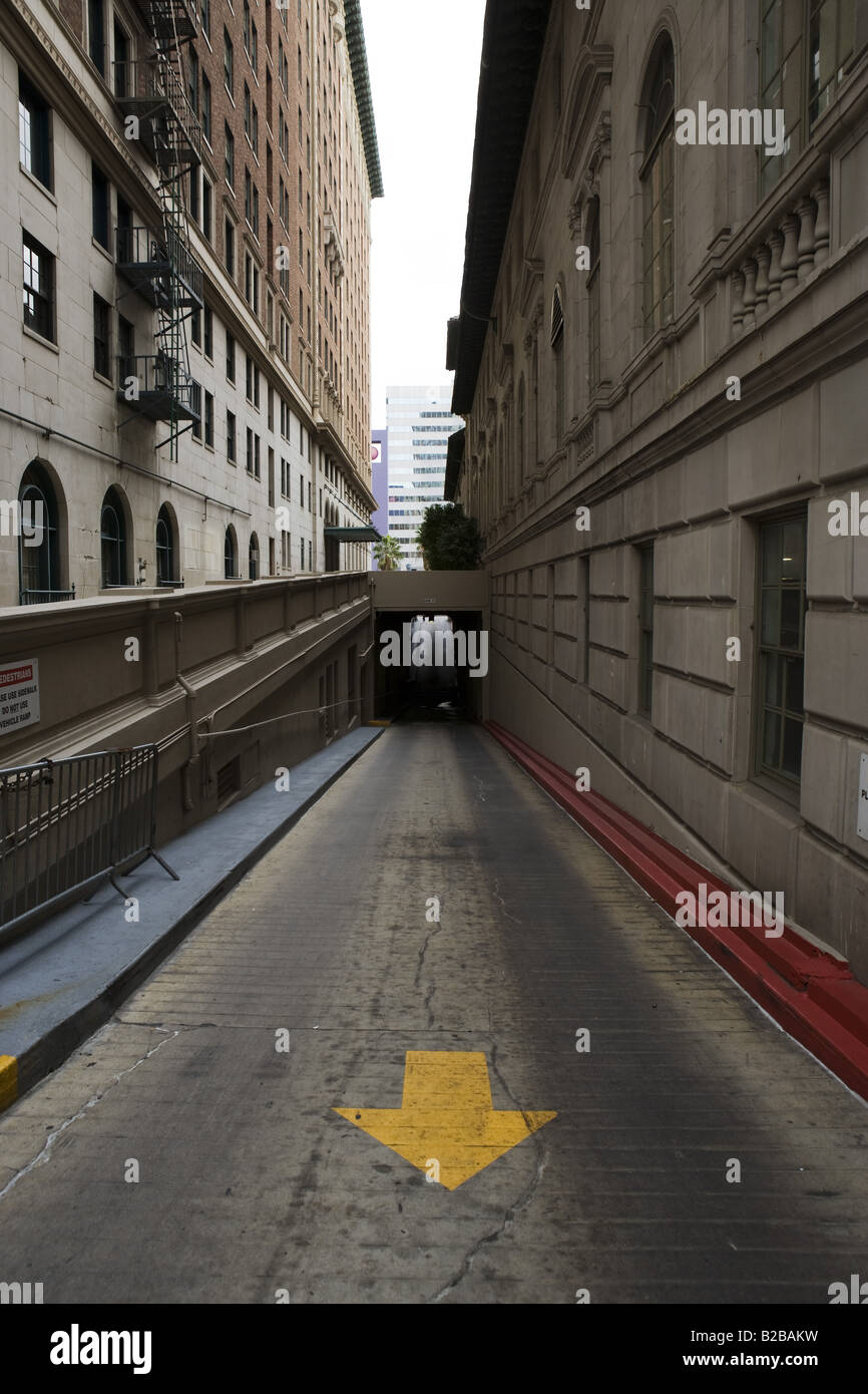 One way road between downtown buildings Stock Photo - Alamy