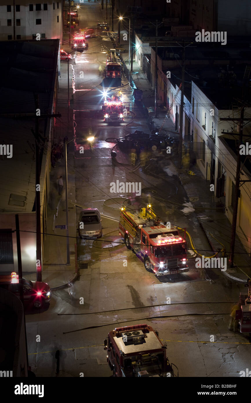 Fire engines arriving at downtown fire Stock Photo - Alamy