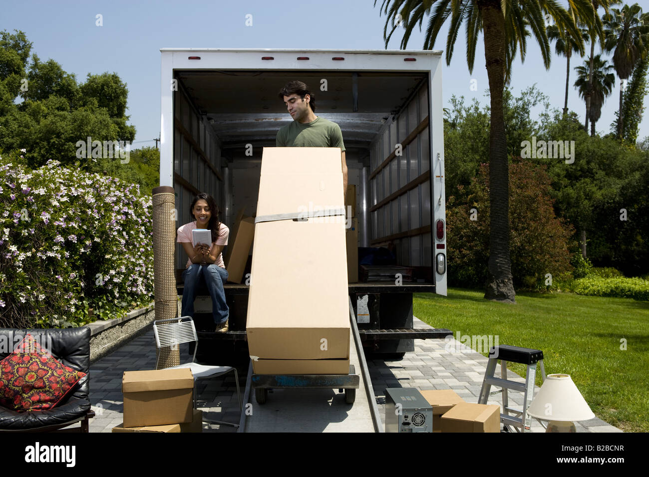Moving house boxes dolly hi-res stock photography and images - Alamy