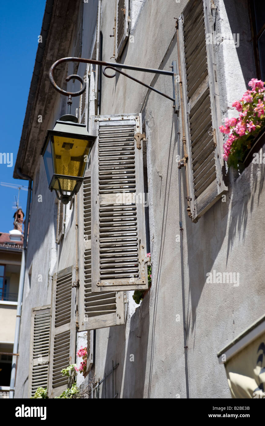 window with open shutters flower box and lantern Stock Photo - Alamy