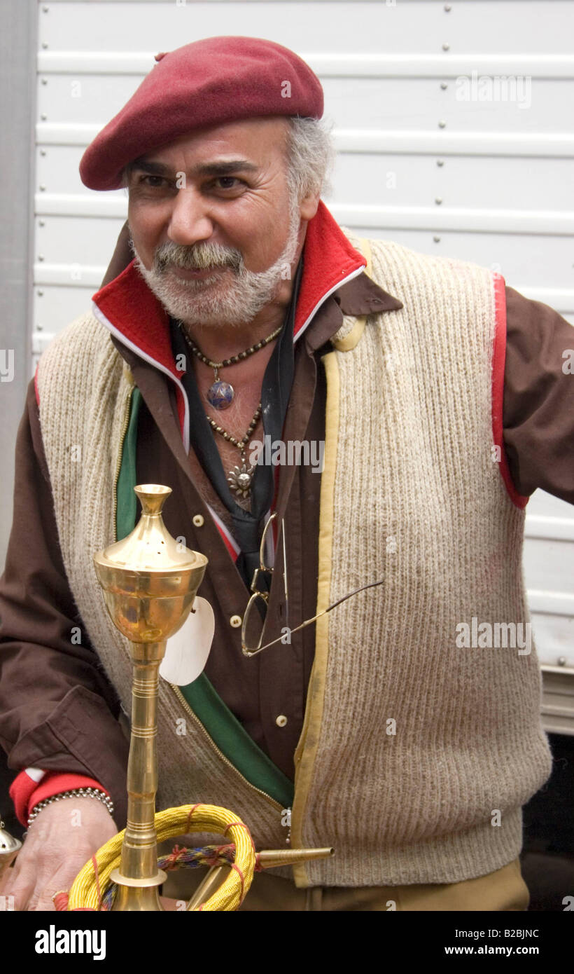 Man with a hookah pipe market stall Rome Italy Stock Photo - Alamy