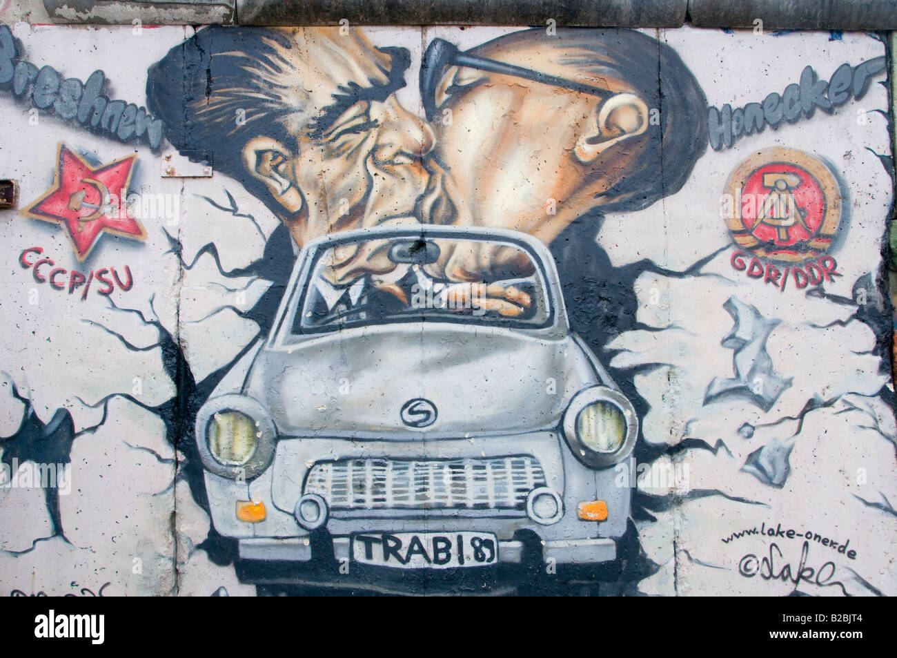 A painted mural depicting Leonid Brezhnev and Erich Honecker kissing at ...