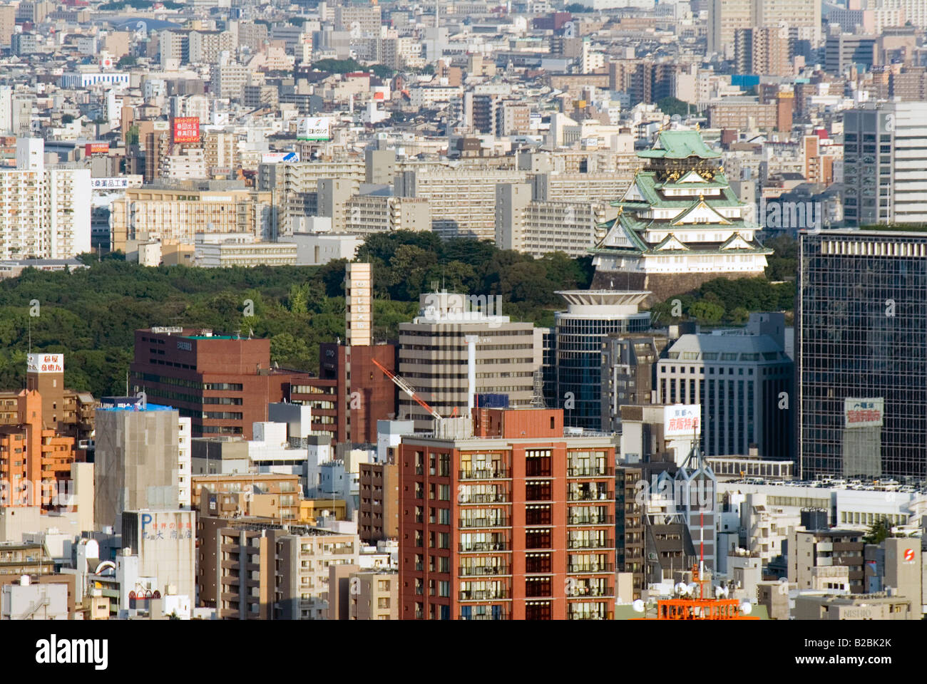 Osaka Castle and surrounding green space of Osaka Park dwarfed by ...
