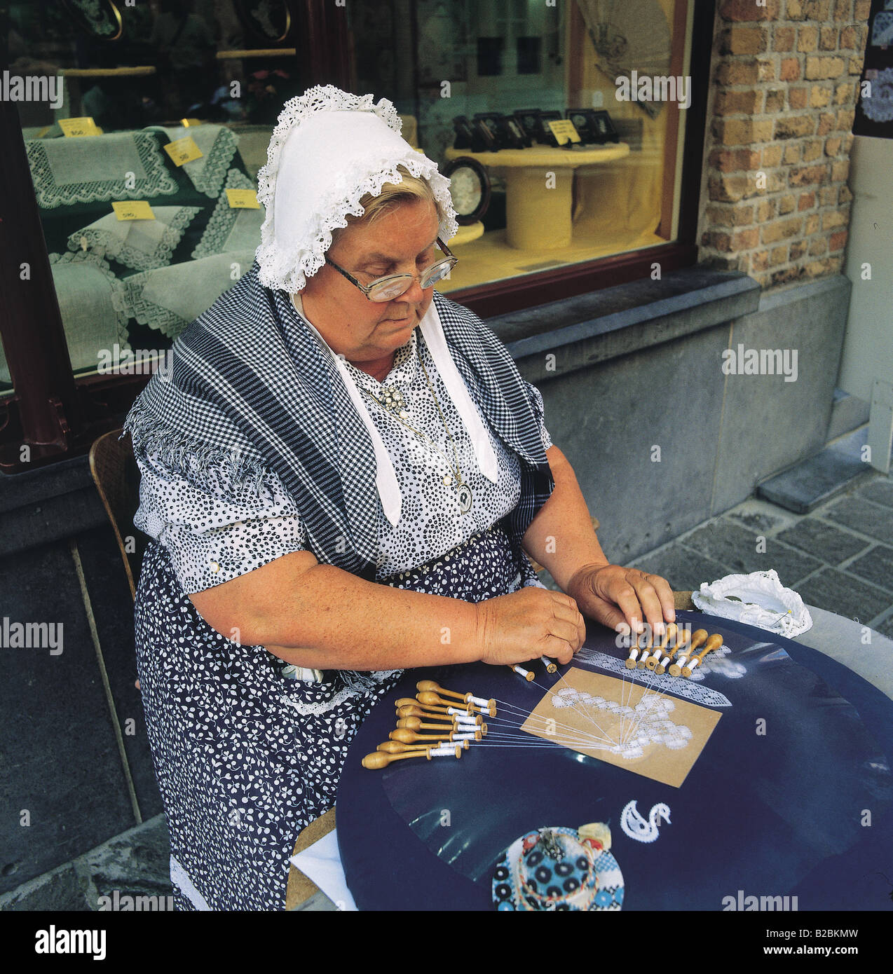 Lacemaker Bruges Belgium Stock Photo - Alamy