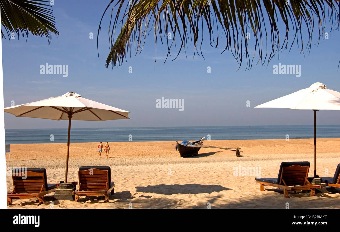 Mobur Beach Leela Palace Hotel South Goa Goa India Young couple walking ...