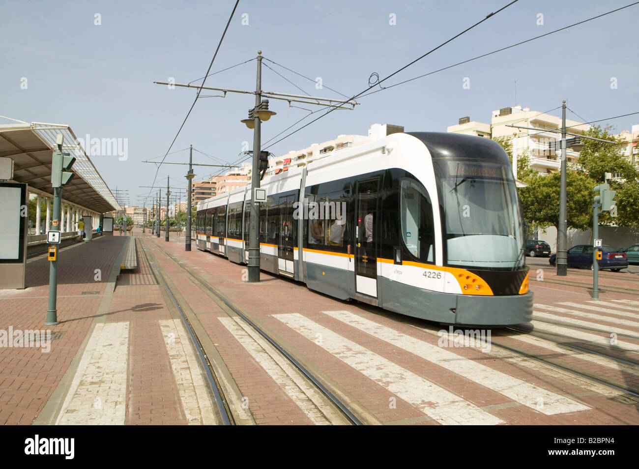 Tram circulating through the streets of Valencia Stock Photo - Alamy
