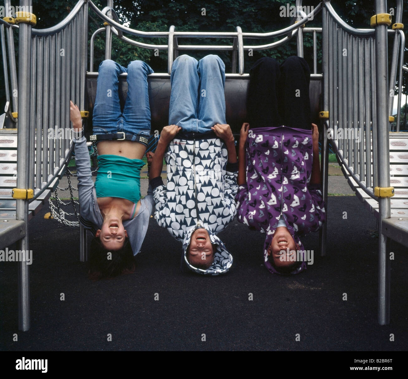 Three teenagers hanging around Stock Photo - Alamy