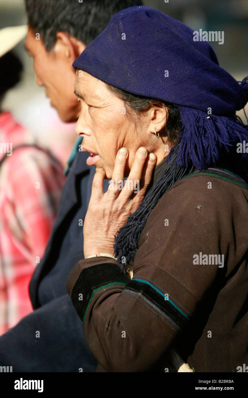 Hani woman at a tribal market near Yuanyang, Yunnan, China Stock Photo ...
