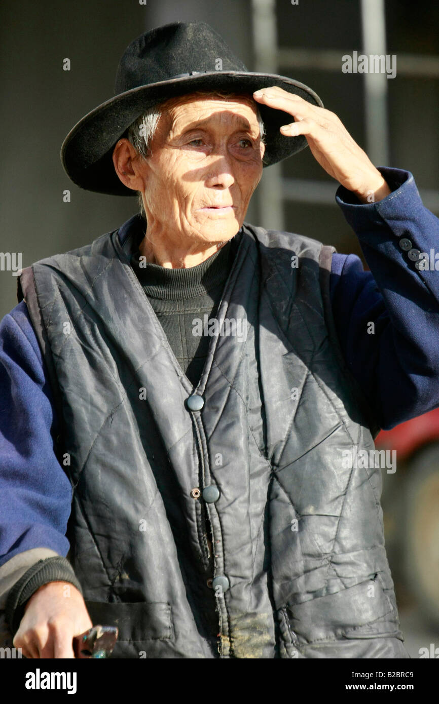 Hani man at a tribal market near Yuanyang, Yunnan, China Stock Photo ...
