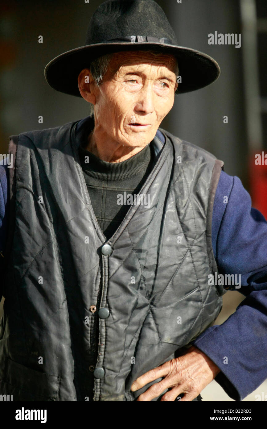 Hani man at a tribal market near Yuanyang, Yunnan, China Stock Photo ...