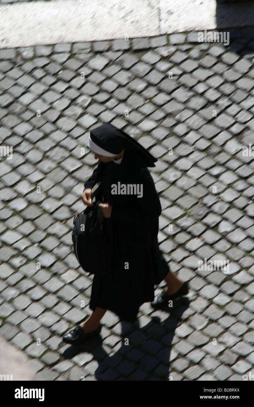 aerial view of nun walking in street in rome italy Stock Photo - Alamy