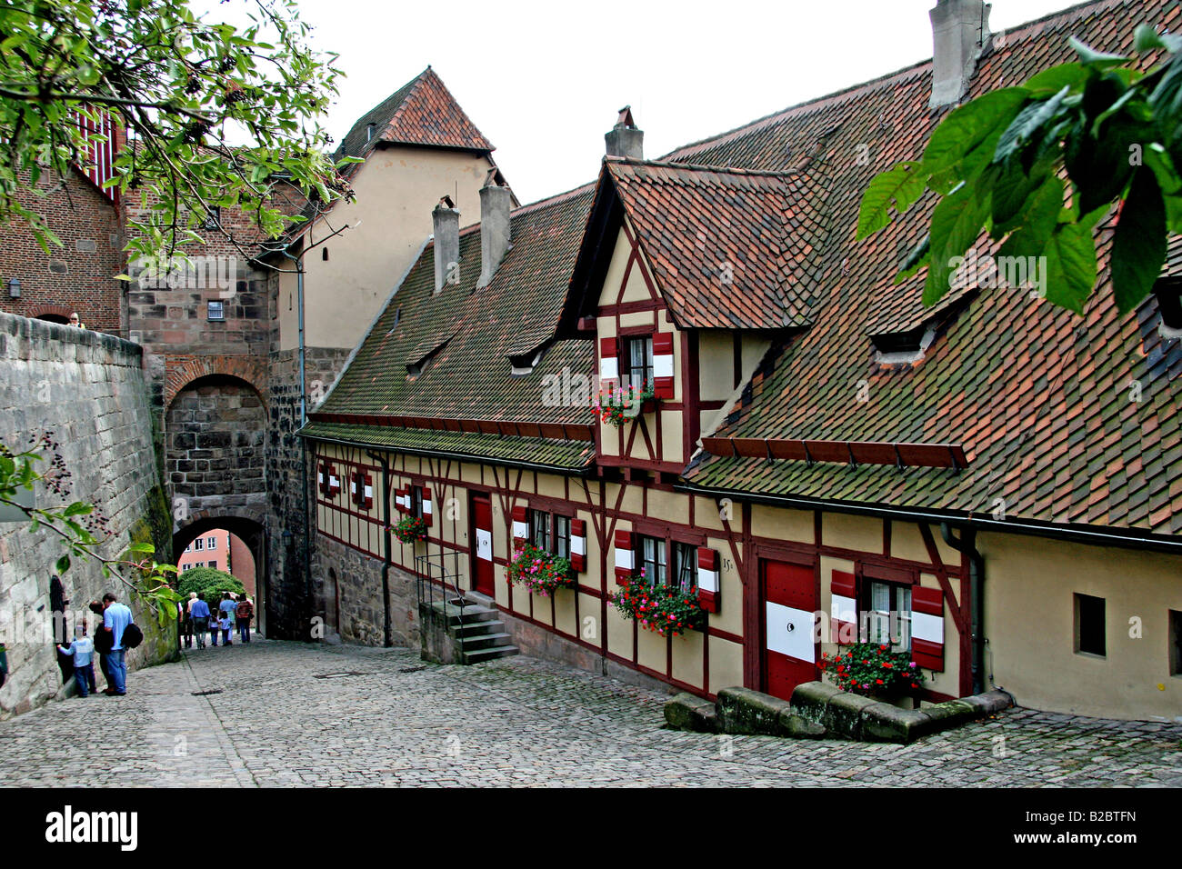 Adjoining building with the entrance gate to the Kaiserburg Castle ...