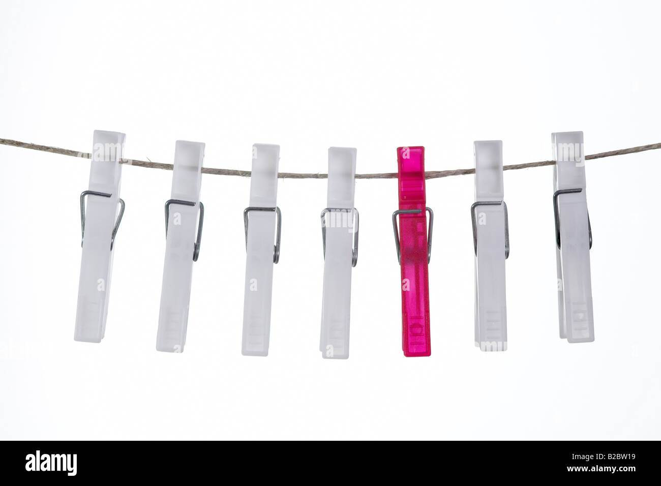 White and red pegs on a line Stock Photo - Alamy