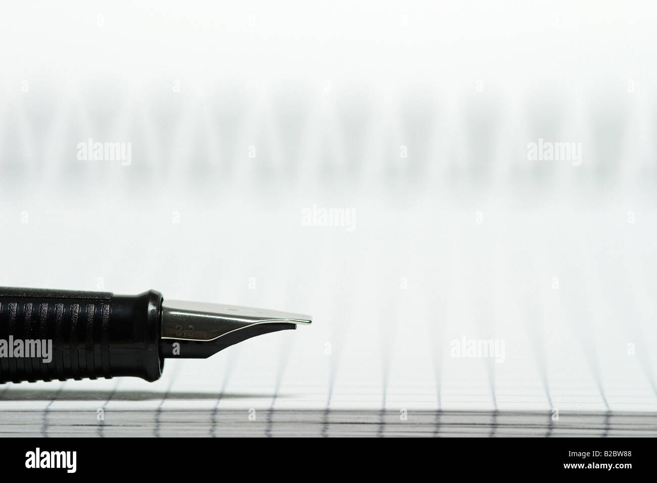 Fountain pen on a notebook Stock Photo - Alamy