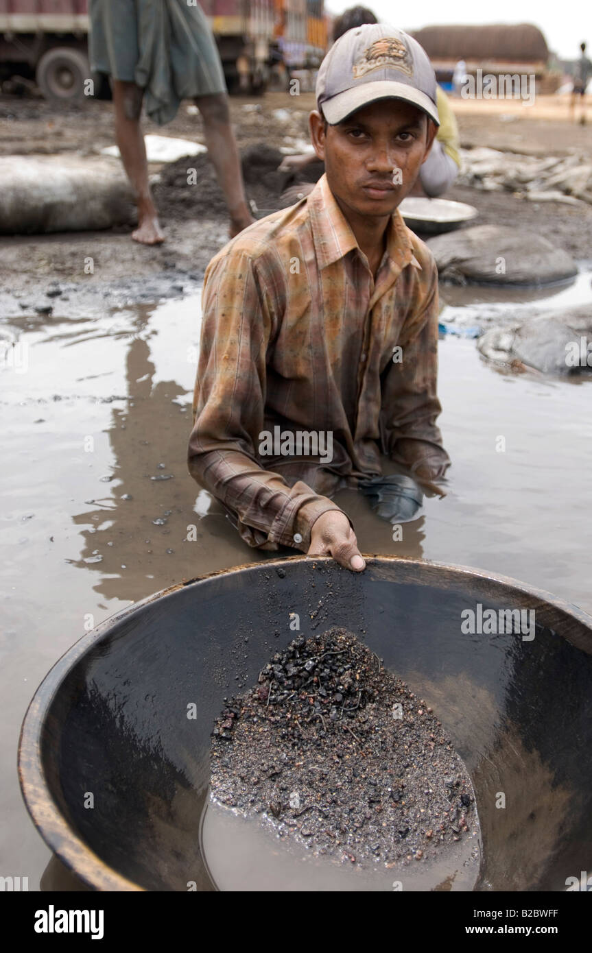Many slum inhabitants earn their living by recycling industrial waste ...