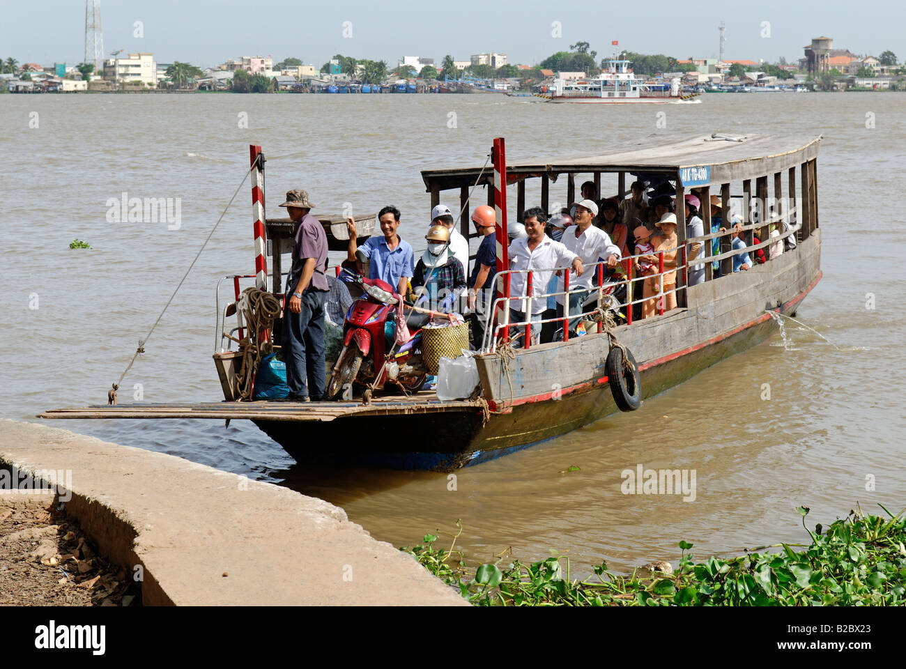 Passenger ferry crossing the Mekong River, Mekong Delta, Vietnam, Asia ...