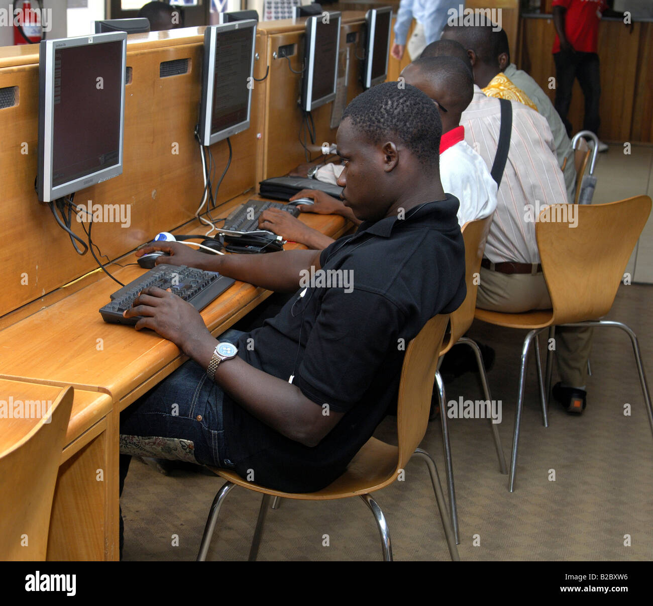 Young men surfing the web in an internet café, Accra, Ghana Stock Photo ...