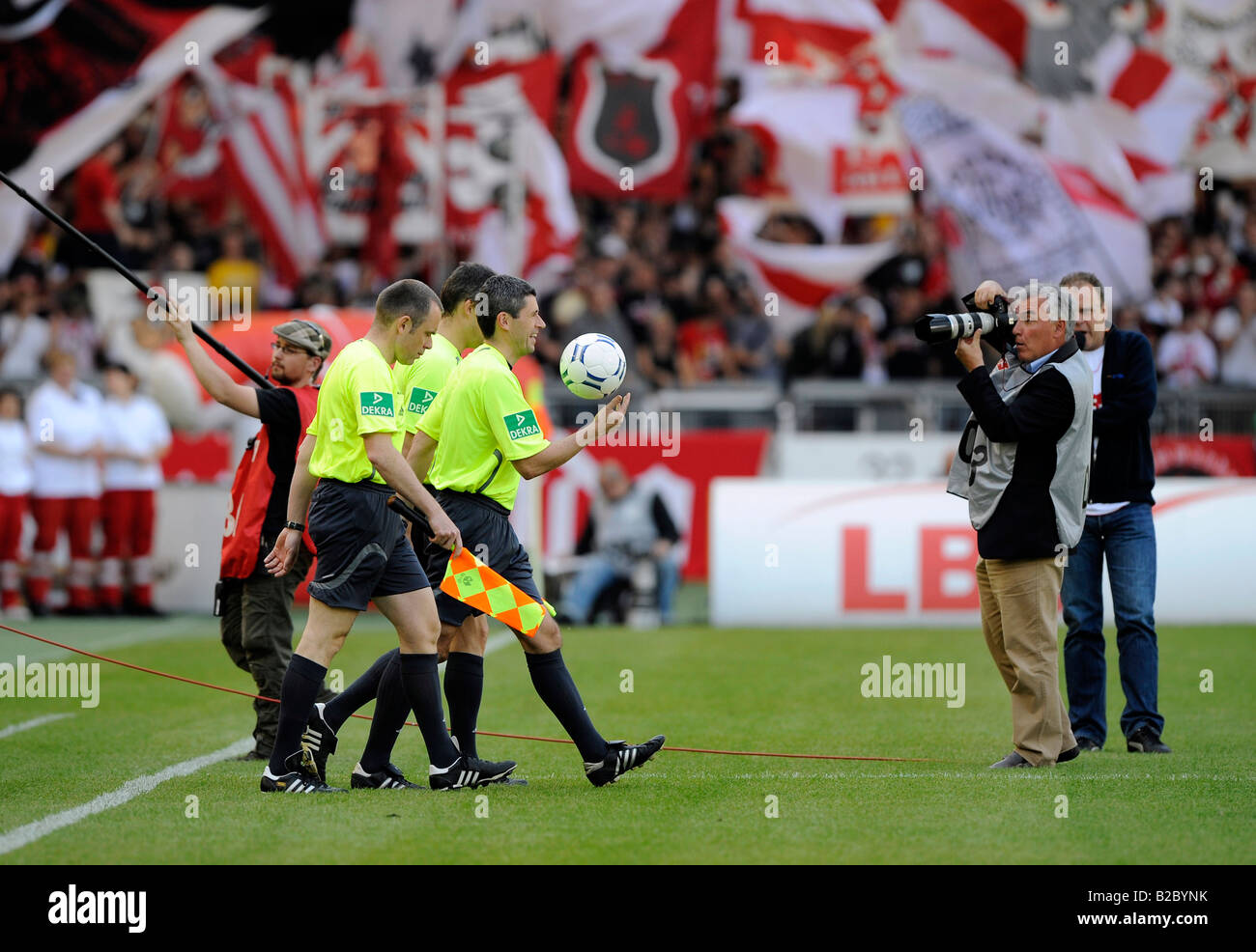 Referee Dr. Markus Merk entering the Daimler Stadium with his ...