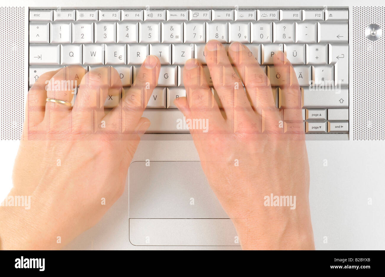 Apple MacBook Pro keyboard, hands typing Stock Photo - Alamy
