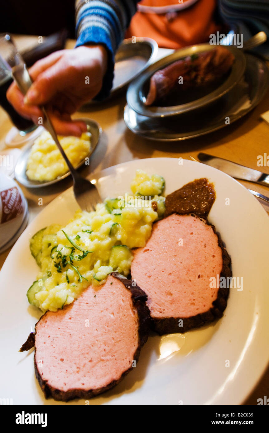 Traditional Bavarian meal served in a restaurant at the Viktualienmarkt ...