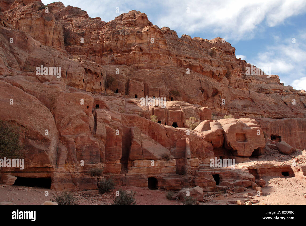 Tombs carved out of the cliff in the ancient Nabataean rock city of ...