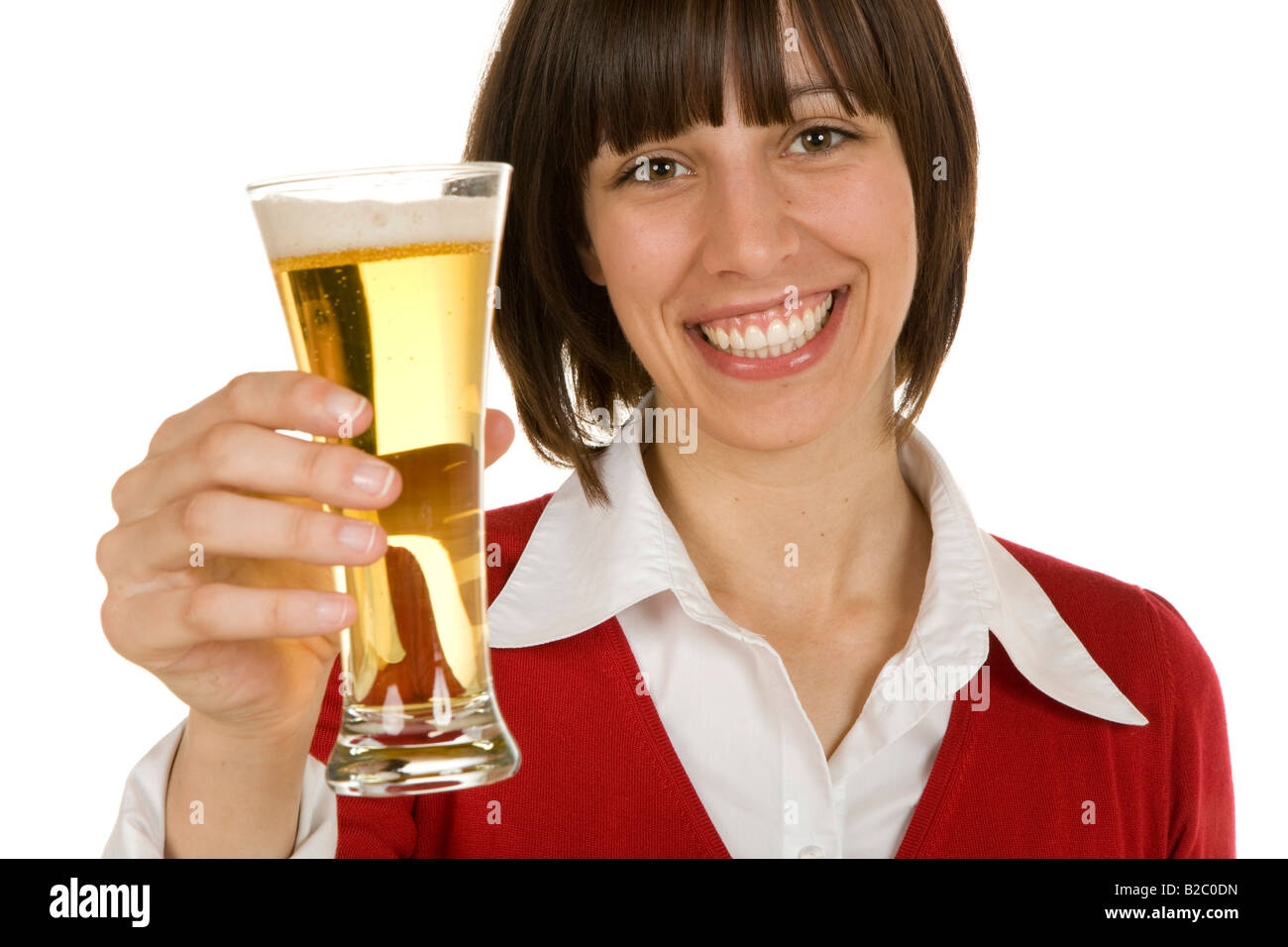 Twenty-year-old woman raising her glass of beer Stock Photo - Alamy