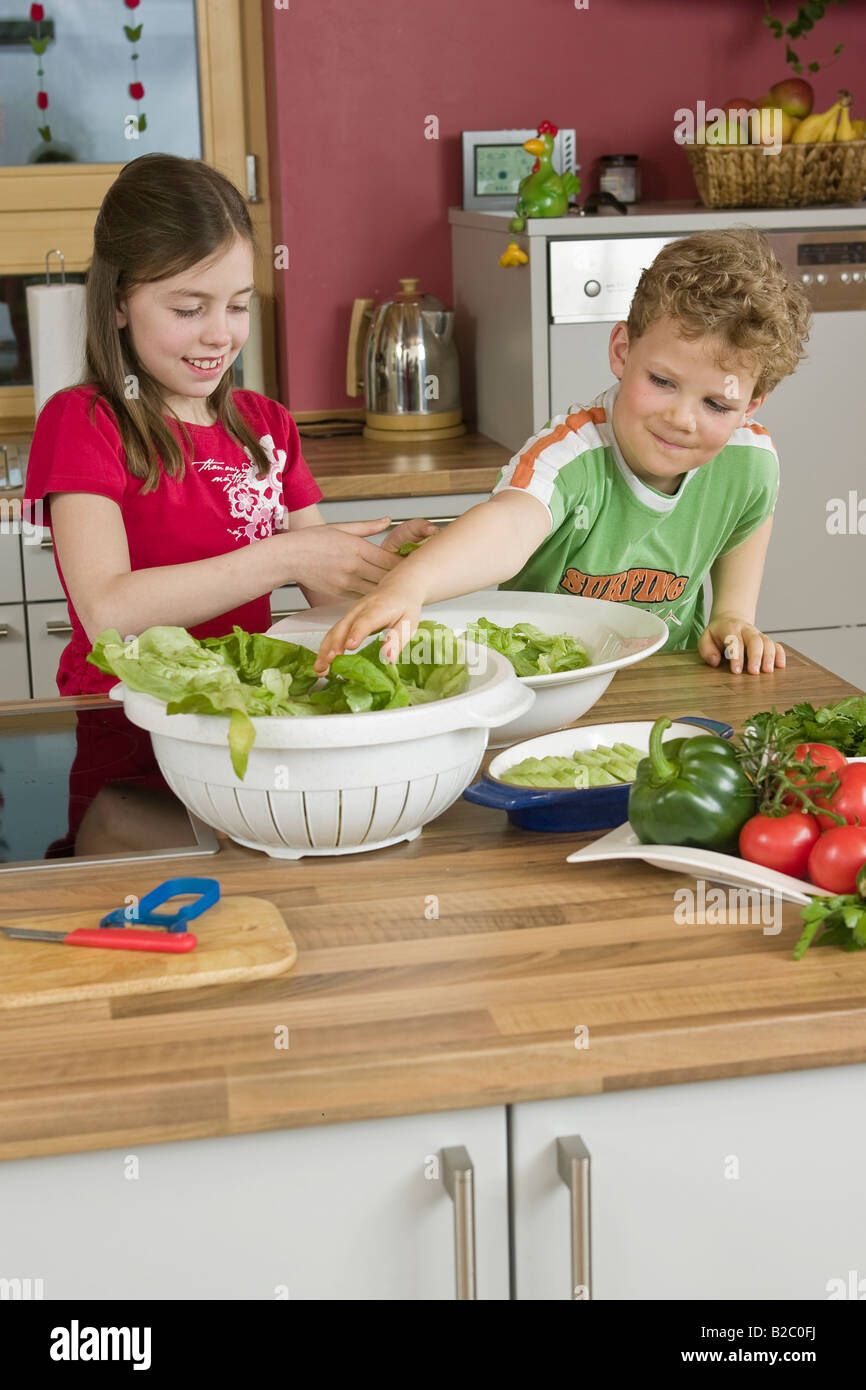 Children, cooking together Stock Photo - Alamy