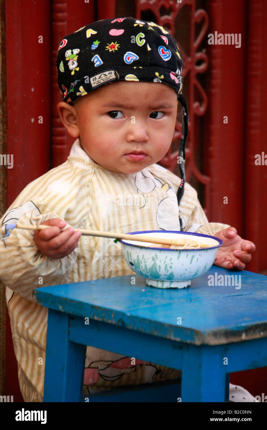 Chinese child at a tribal market near Yuanyang, Yunnan, China Stock ...