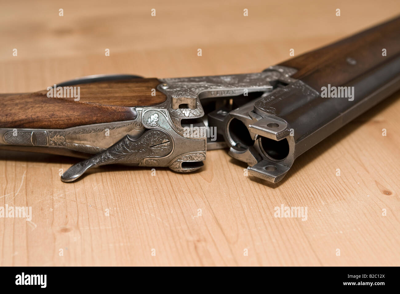 Hunting weapon, shotgun, long gun with engraving Stock Photo - Alamy