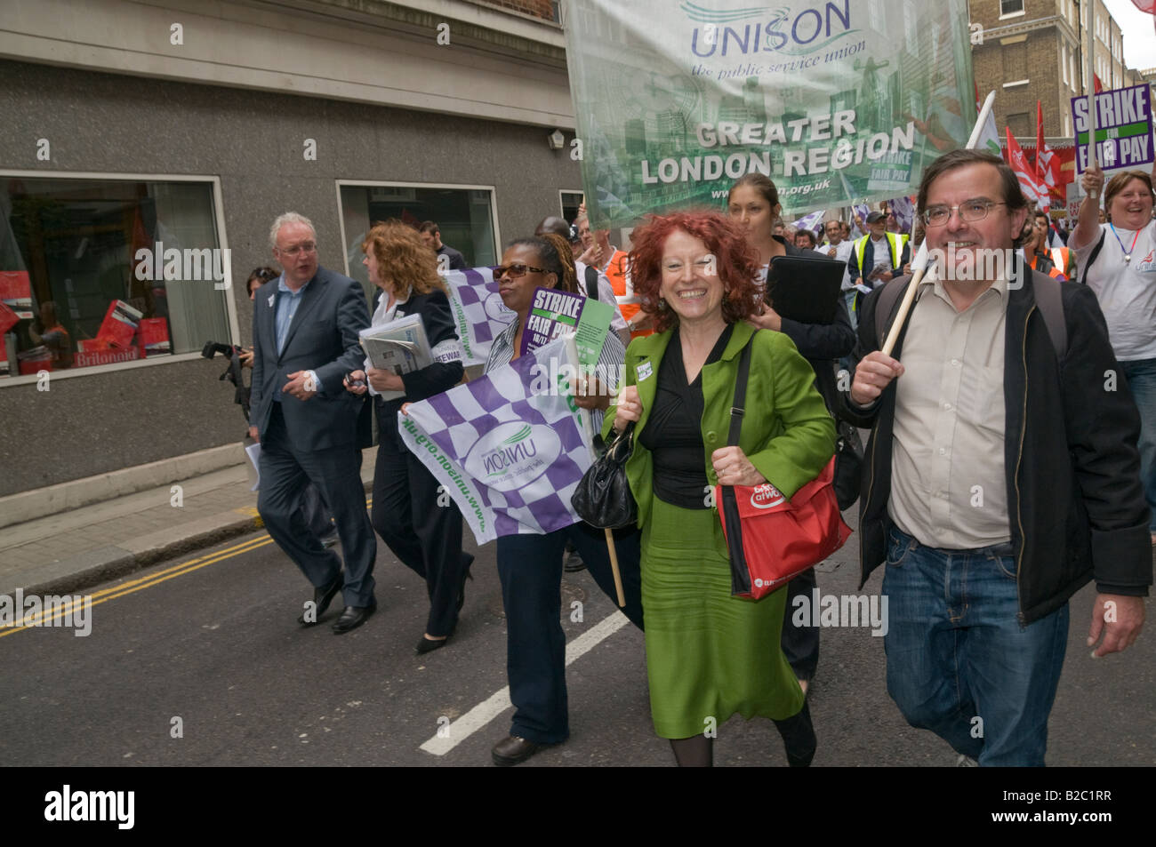 Men and women at the front of the striking local government workers ...