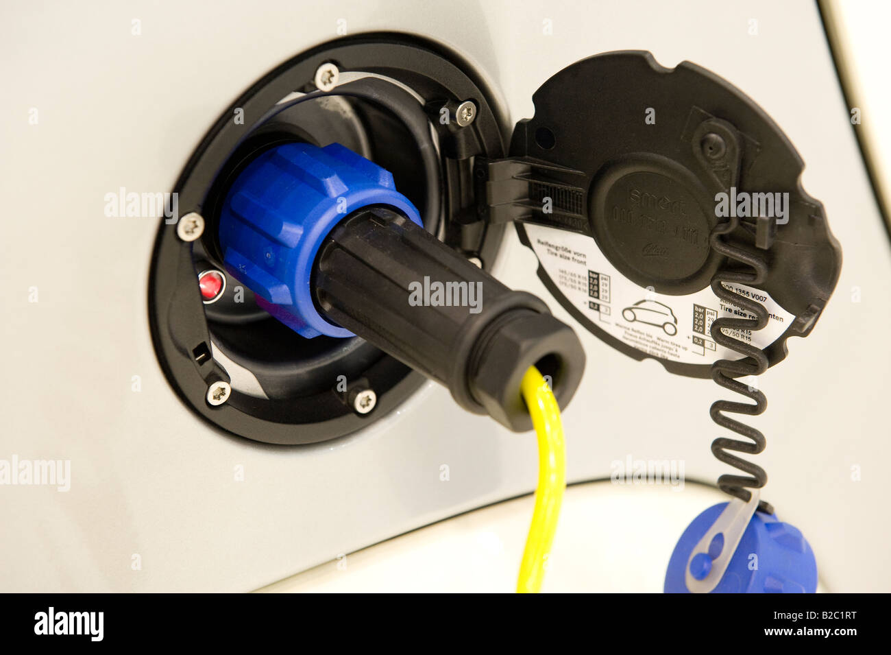 A power socket on a electric car Stock Photo - Alamy