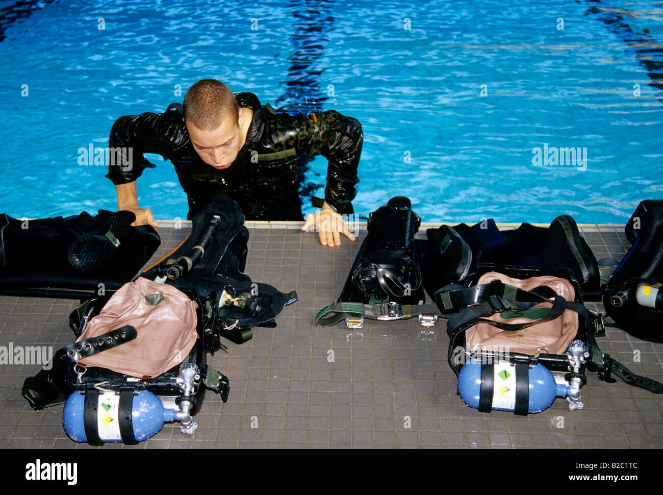 Bundeswehr, German Federal Defense Force combat swimmer climbing out of ...