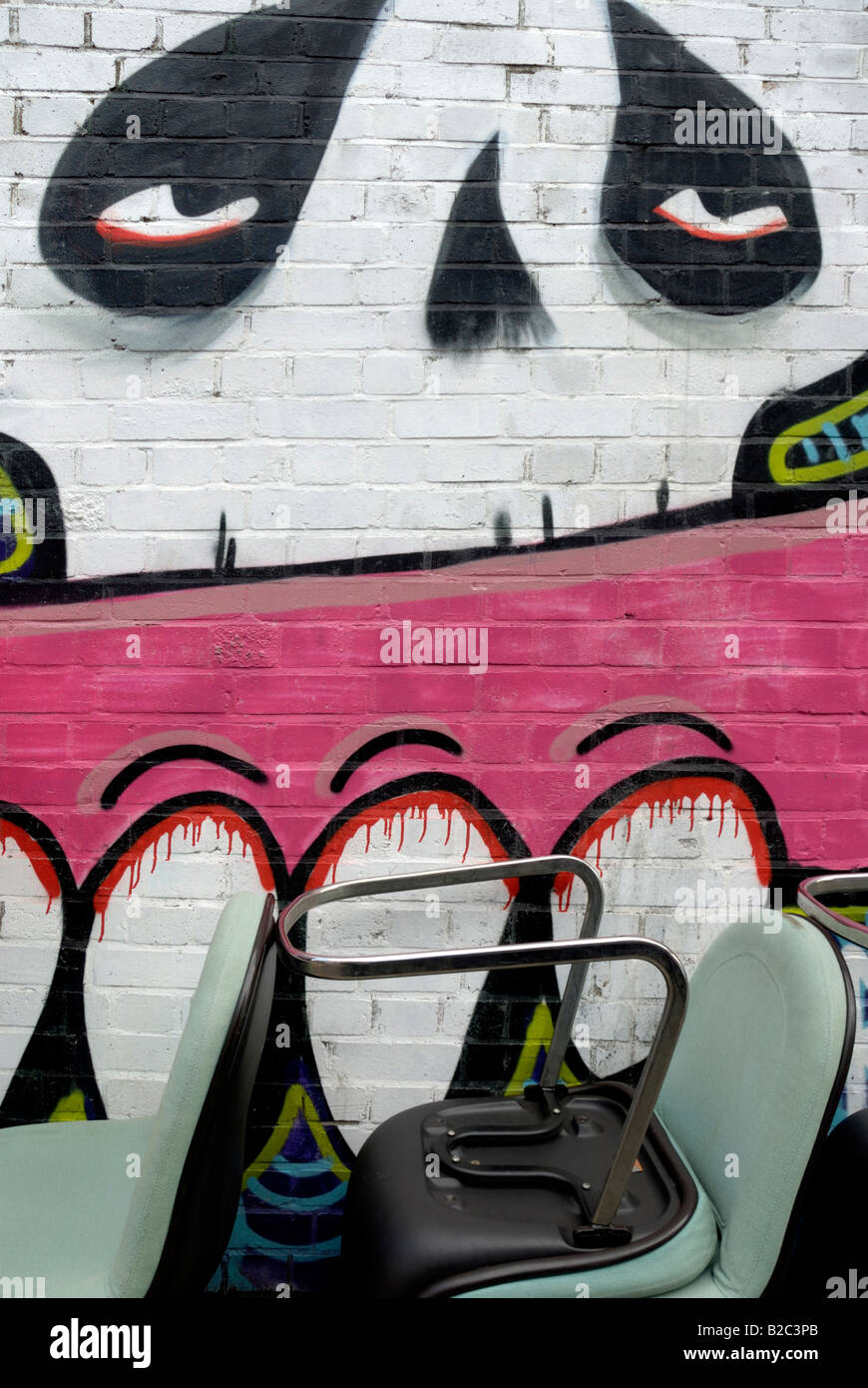 "Burning Candy" - "Sweet Toof"s mural on bricked wall with vintage ...