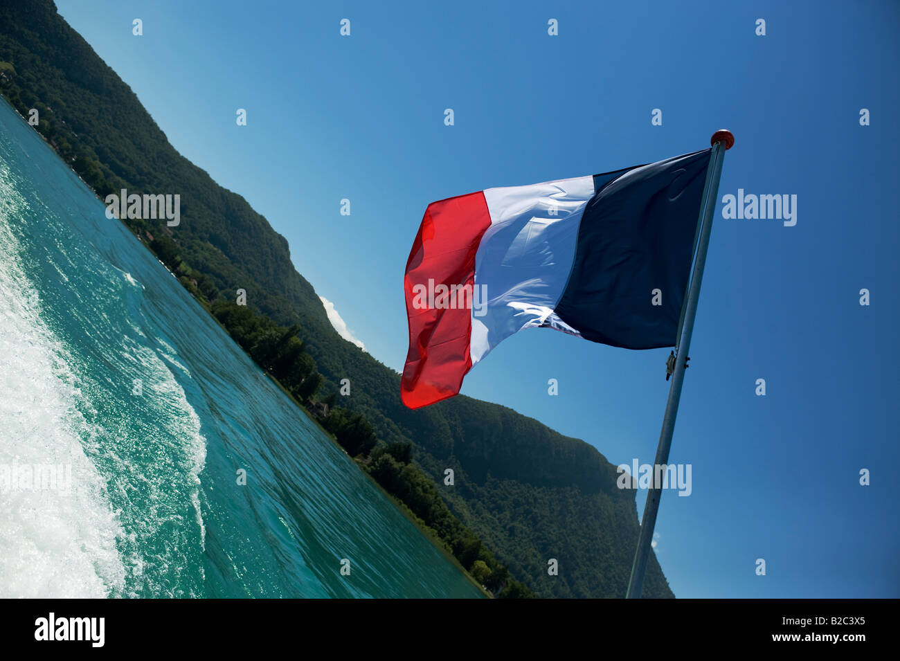 lake annecy and french flag Stock Photo - Alamy