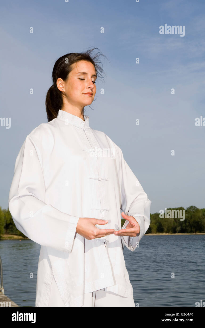 Young woman practising Qi Gong Stock Photo - Alamy