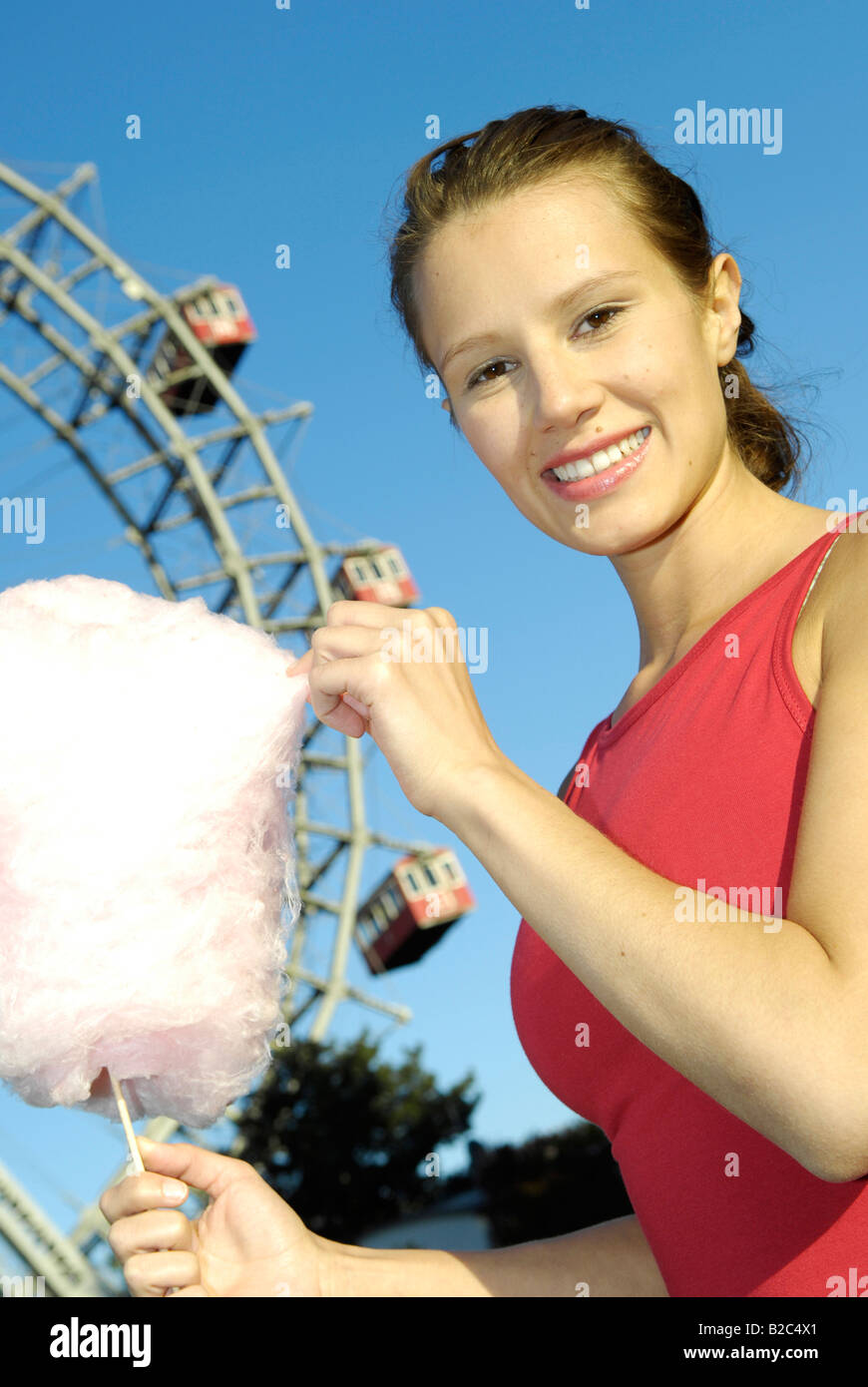 amusement park Prater Vienna, young woman with candy floss, Giant Ferry ...