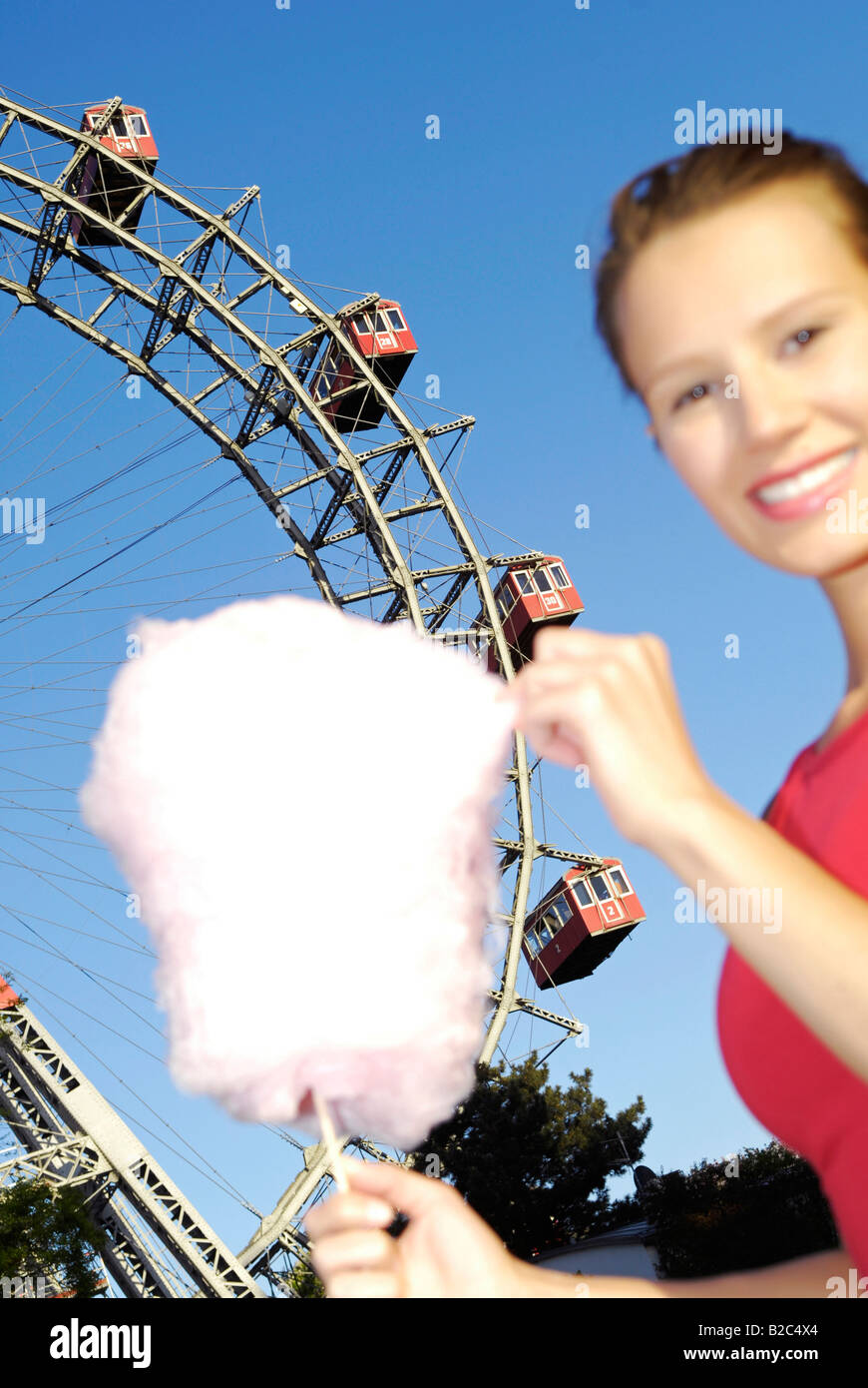 amusement park Prater Vienna, young woman with candy floss, Giant Ferry ...