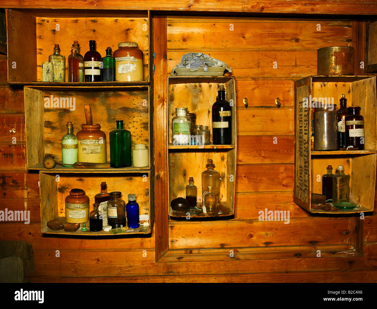 Shackleton's Hut at Cape Royds, interior shelving with bottles, Ross ...