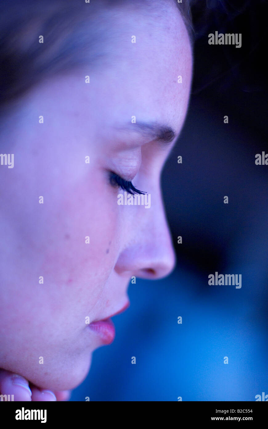 Young woman, side-face Stock Photo - Alamy