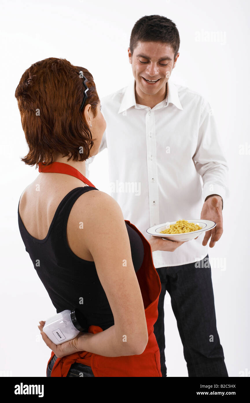 Woman poisoning man Stock Photo - Alamy