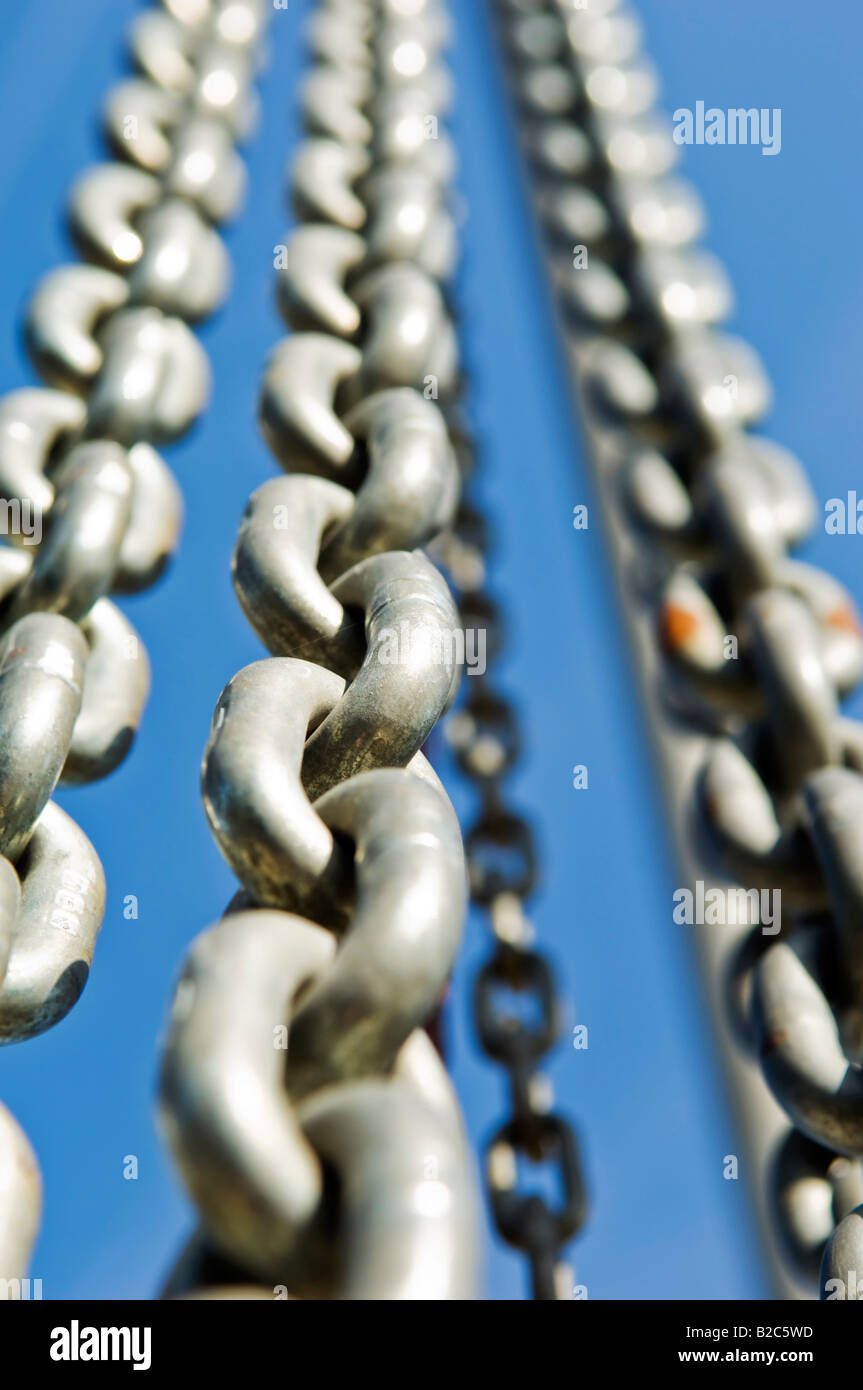 Group of chains against a blue sky Stock Photo - Alamy