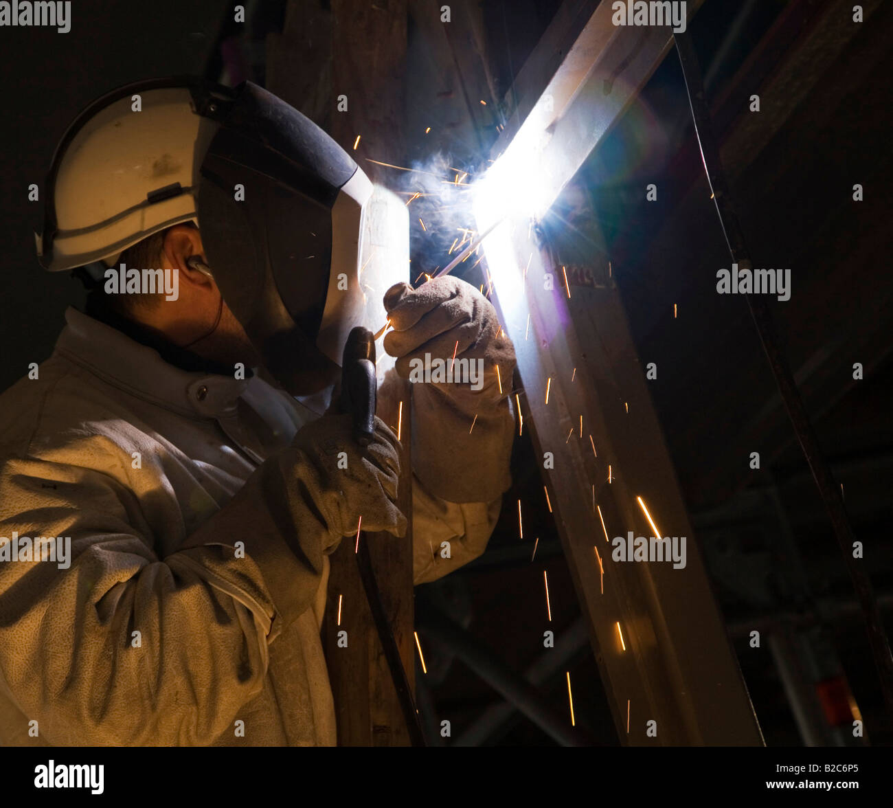 Craftsman building and welding a steel framework, Hamburg, Germany ...